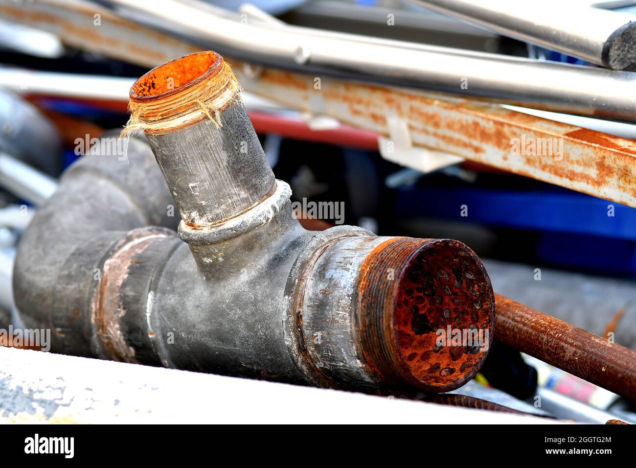 scrap metal in a container Stock Photo - Alamy