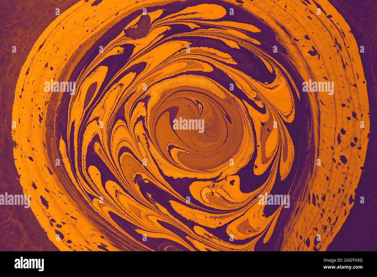 Abstract painting with mixed orange and purple oil paint colors ...