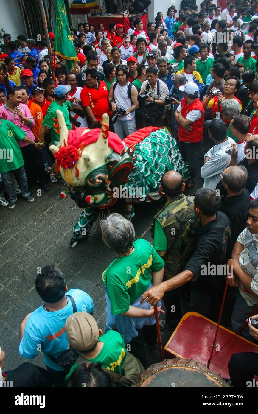 People watching the Liong Dance at the Cap Go Meh show. Cap Go Meh is ...
