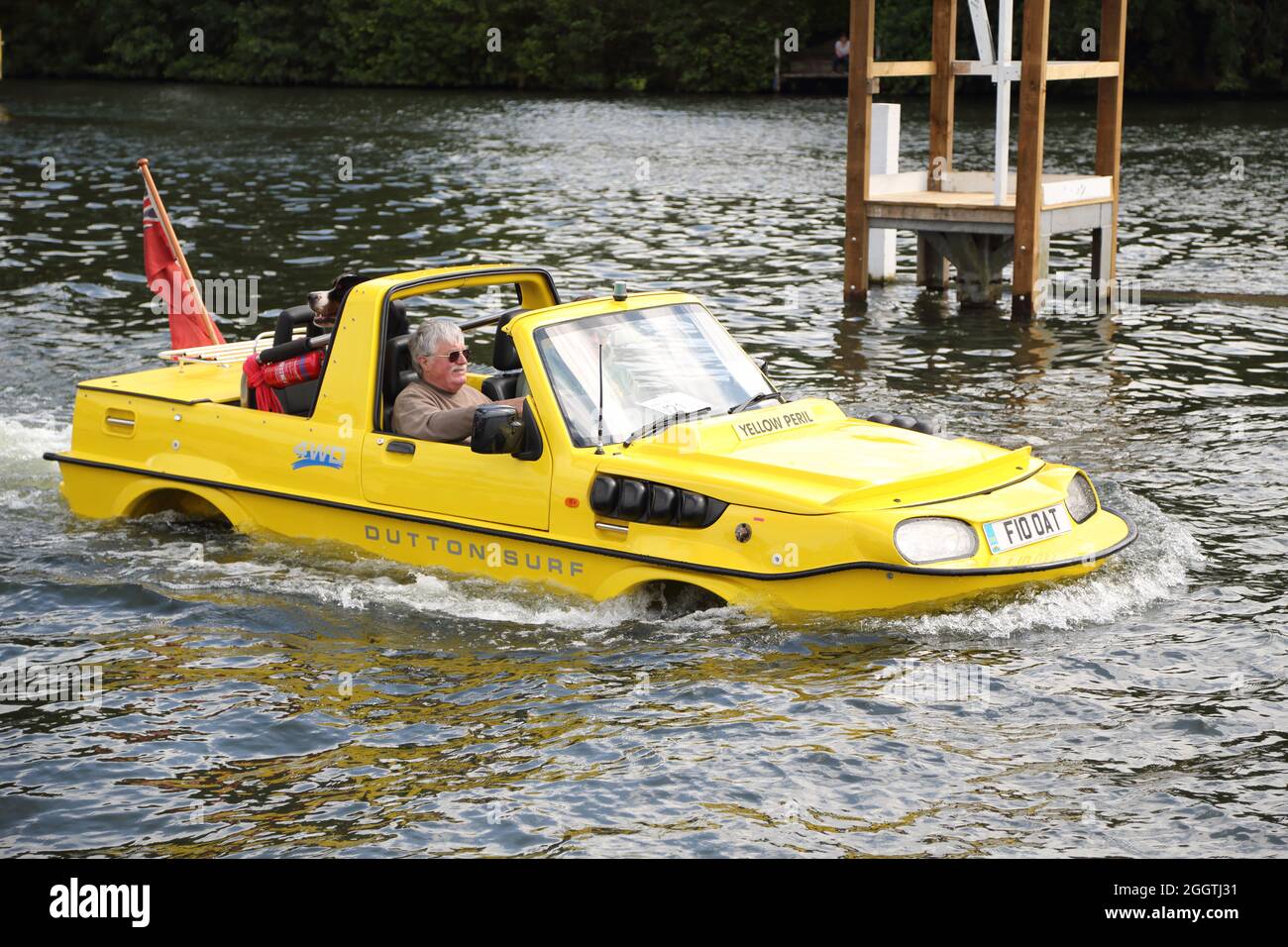 A vintage amphibious Dutton car travelling down the river Thames at the ...