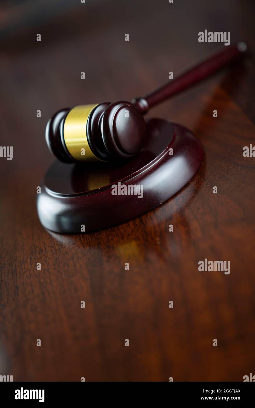 Law theme. Court library - gavel of the judge and books Stock Photo - Alamy