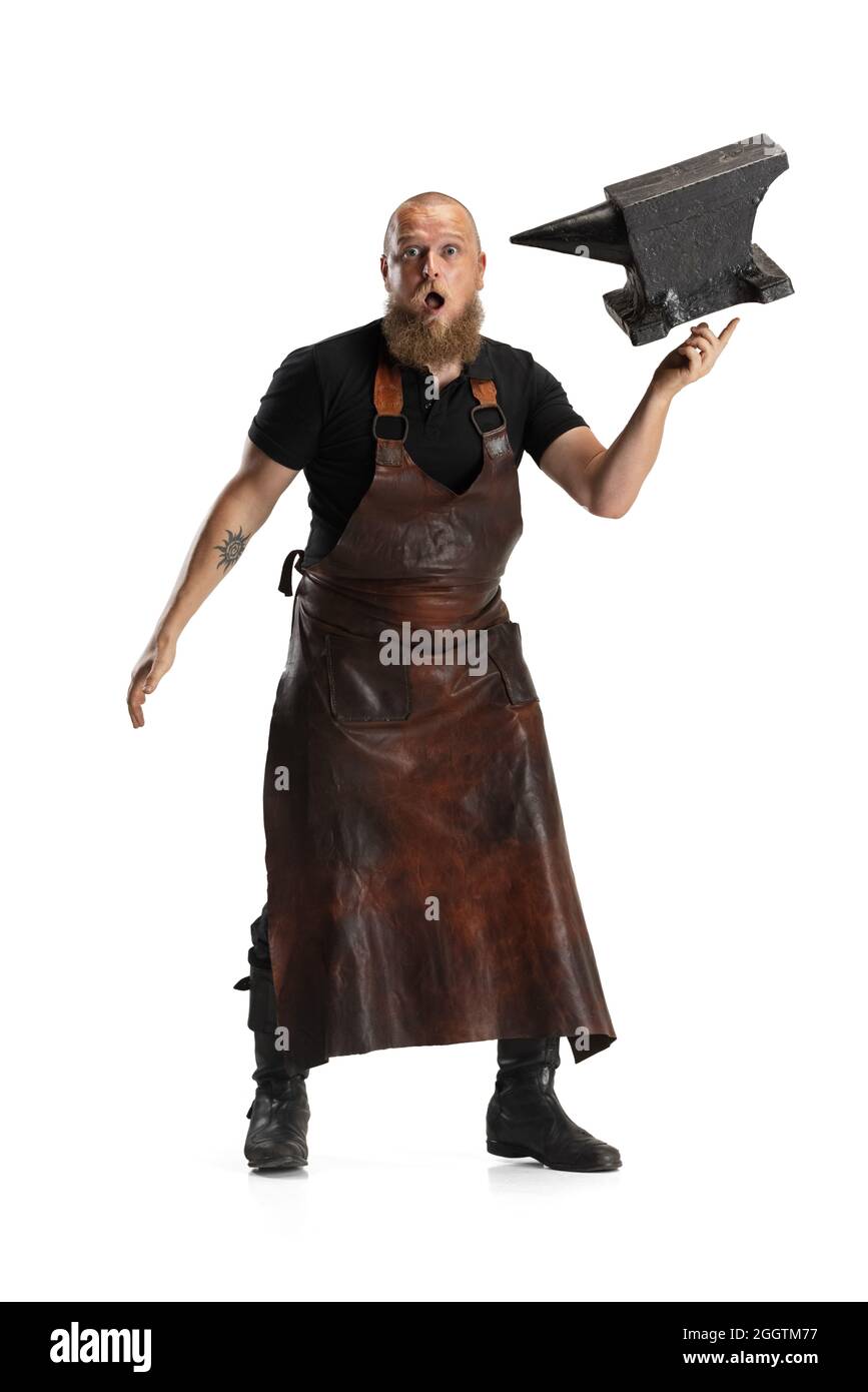 One muscular bearded bald man, blacksmith wearing leather apron or ...