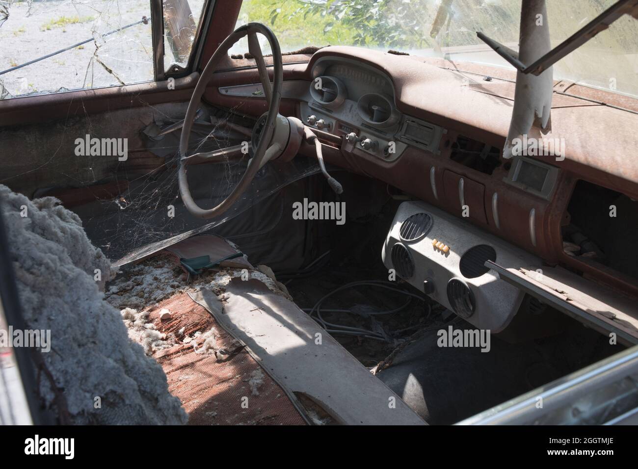 View into the interior of a rotten forgotten car Stock Photo - Alamy