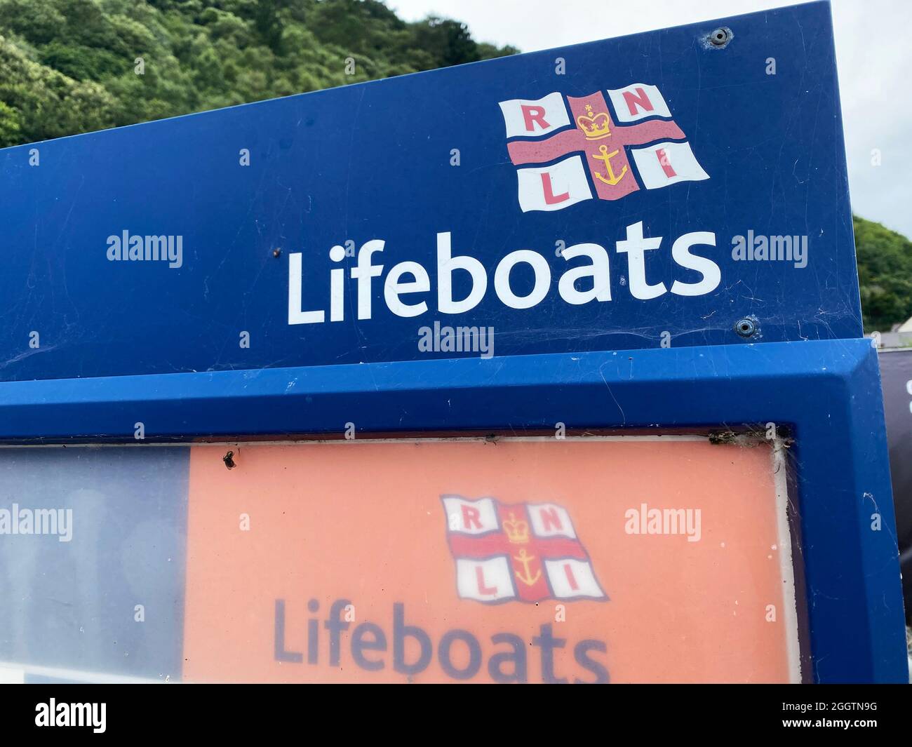 MINEHEAD, UK - August 2021: RNLI Lifeboat signs outside a cost guard ...