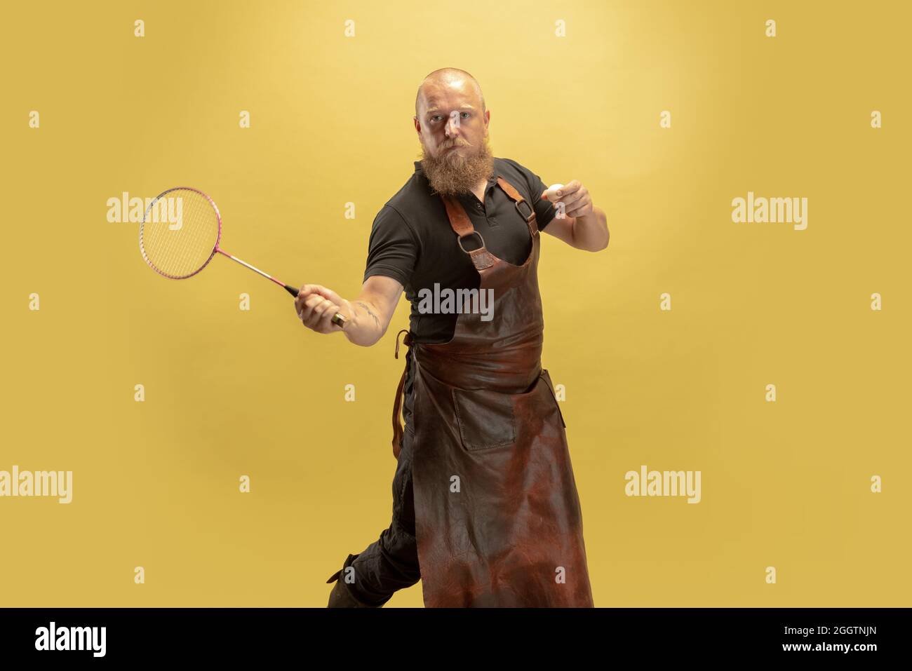 Comic portrait of muscular bearded bald man, blacksmith in leather ...