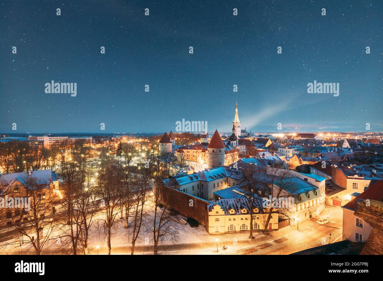 Tallinn, Estonia. Night Starry Sky Above Old Castle Walls Architecture ...