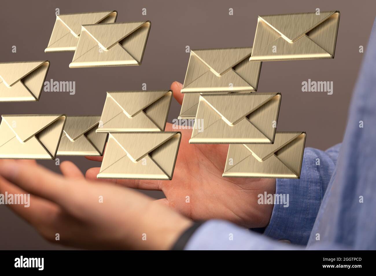 Hand holding message icons - the concept of networking Stock Photo - Alamy