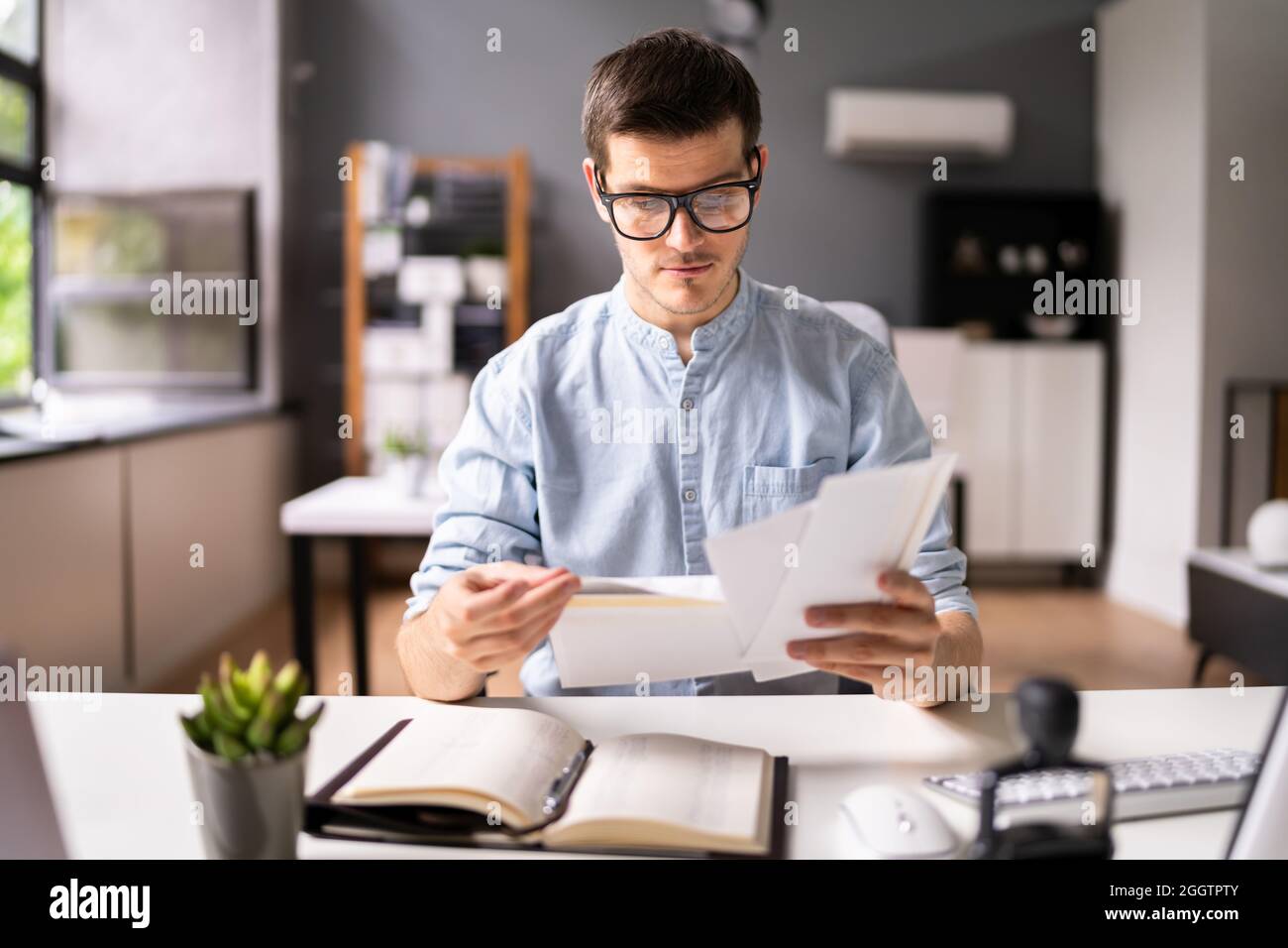 Professional read hi-res stock photography and images - Alamy