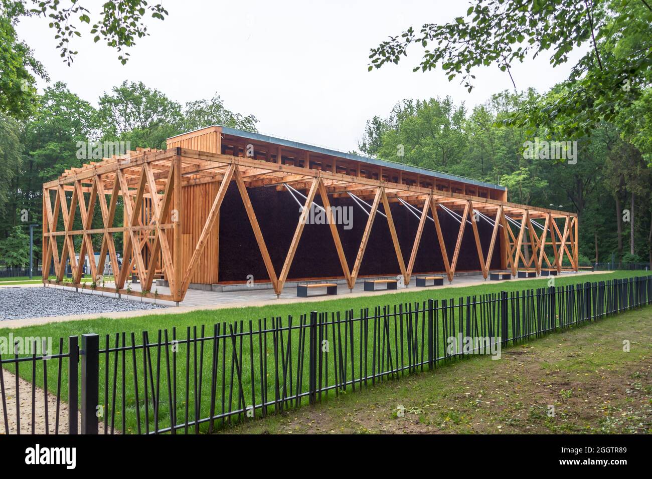 A graduation tower in a city park surrounded by greenery, a place for ...