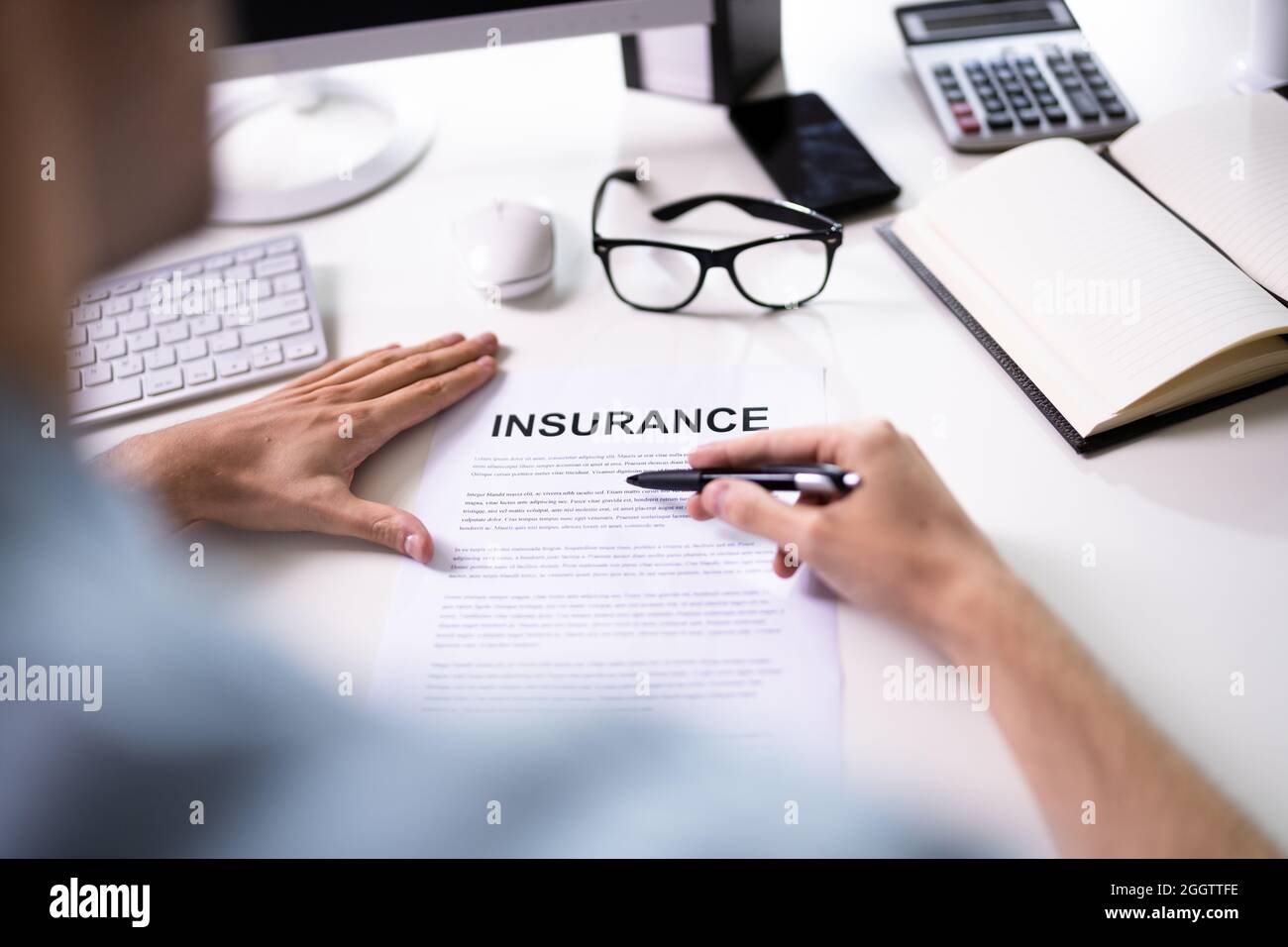 Insurance Policy Concept. Company Agent With Document Stock Photo - Alamy