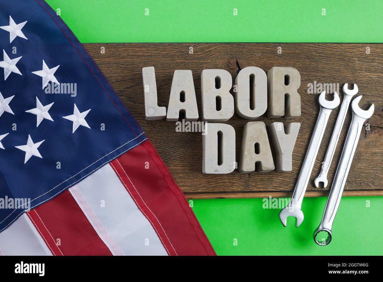 Happy Labor Day banner. USA flag and letters on rustic wooden ...