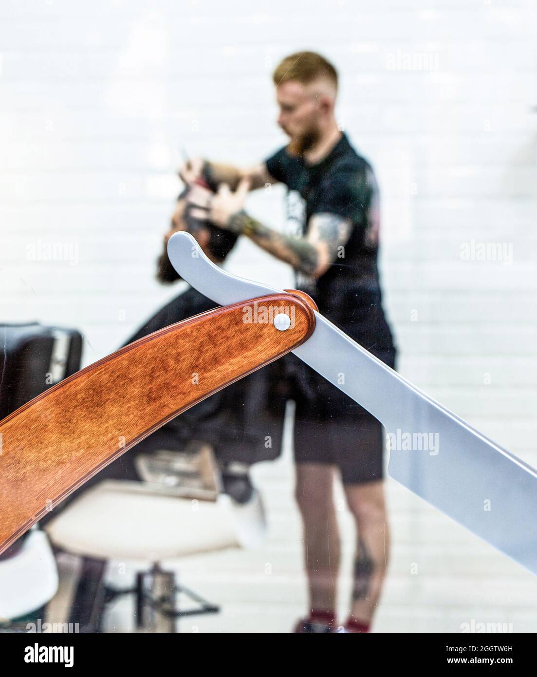 Straight razor, barbershop. Barber shop salon. Men haircut. Man in ...