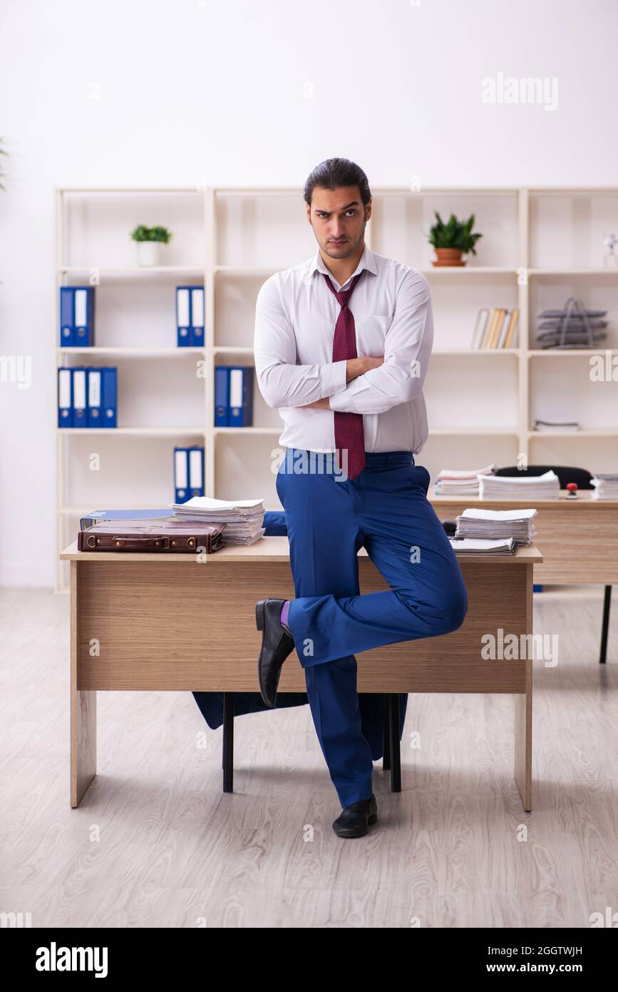 Extremely tired businessman male employee in the office Stock Photo - Alamy