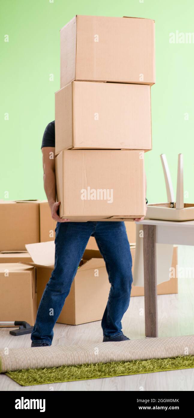 Delivery man falling stack boxes hi-res stock photography and images ...