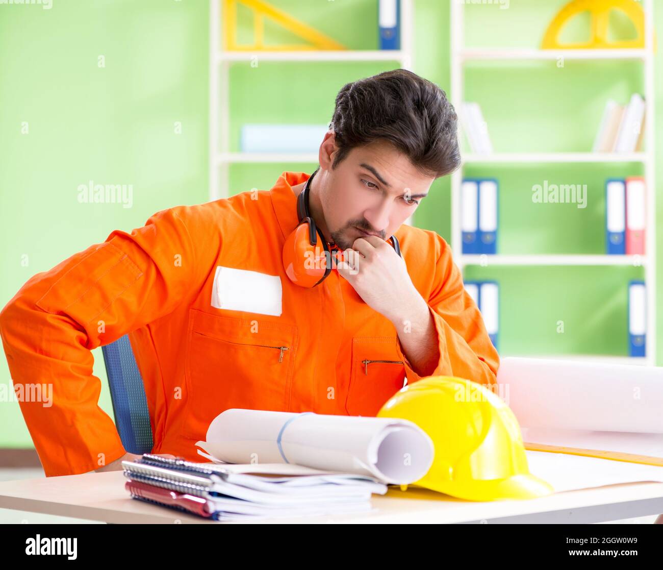 The construction supervisor planning new project in office Stock Photo ...