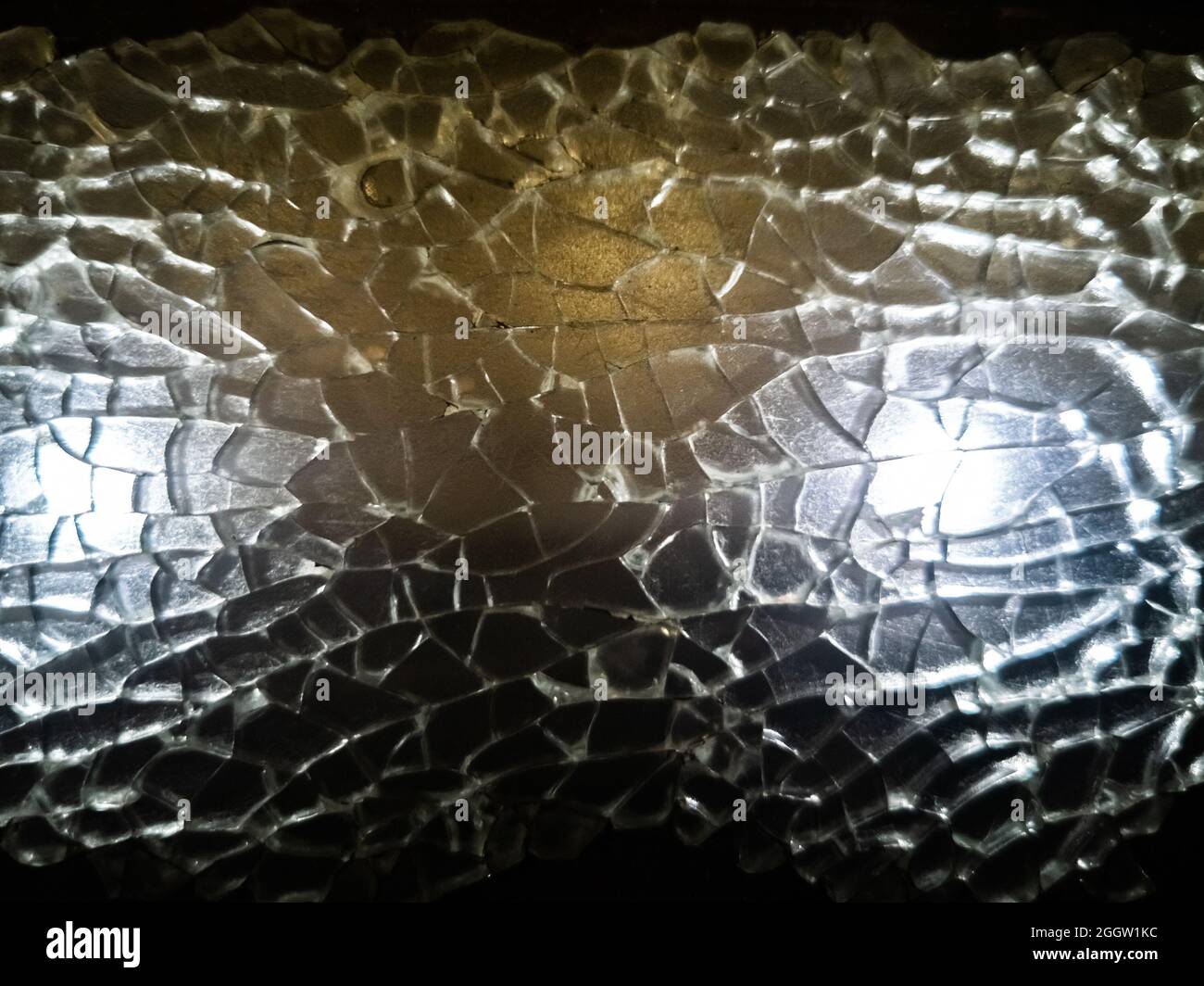 texture broken glass window shards highlighted. close-up selective ...