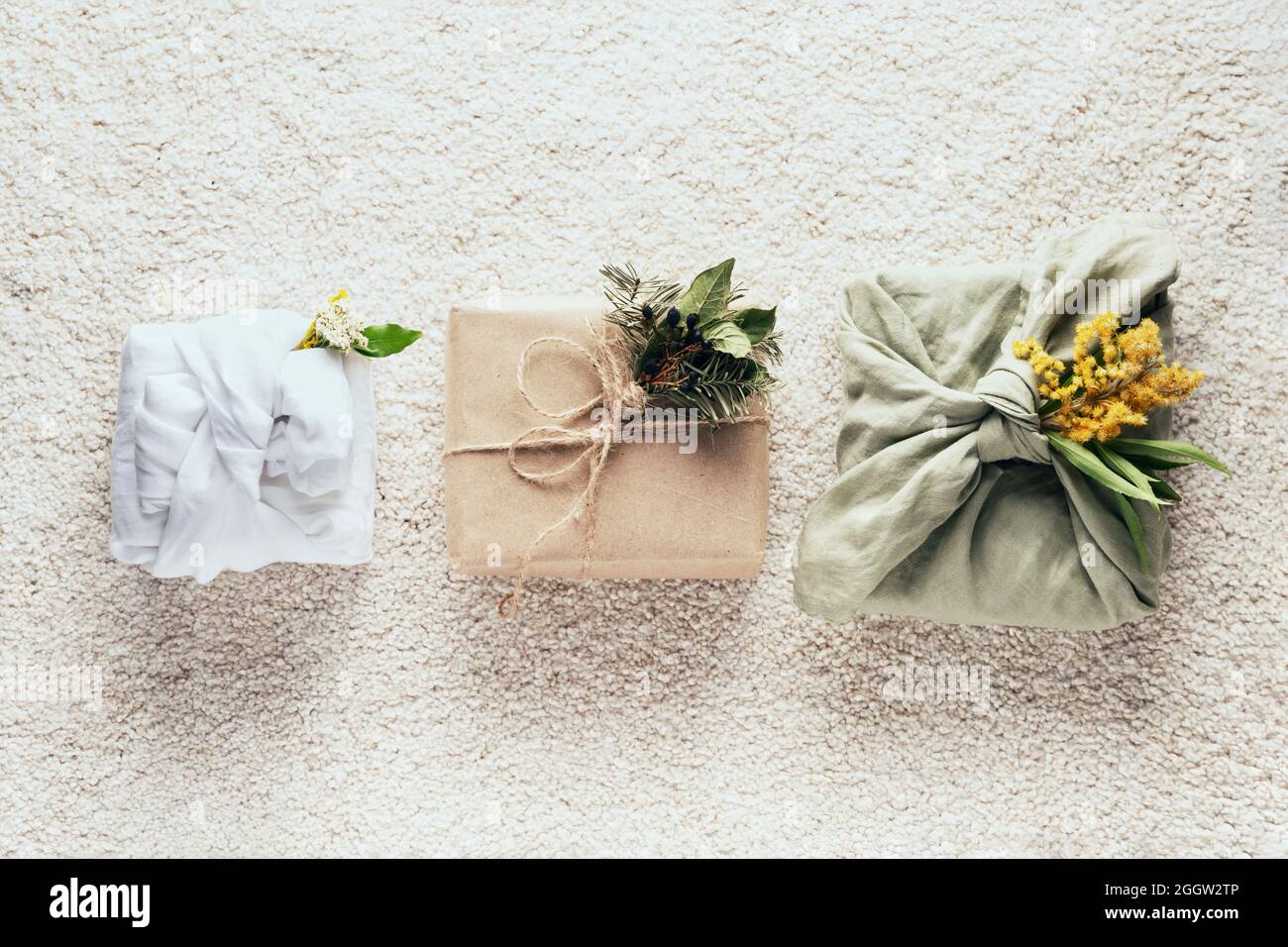 Three tied gift boxes hi-res stock photography and images - Alamy