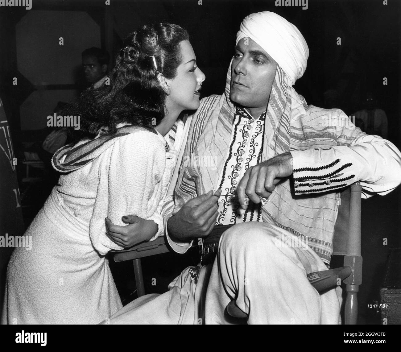 On the set jon hall with maria montez hi-res stock photography and ...