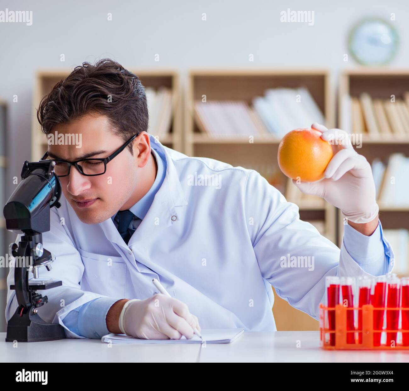 The scientist working on organic fruits and vegetables Stock Photo - Alamy
