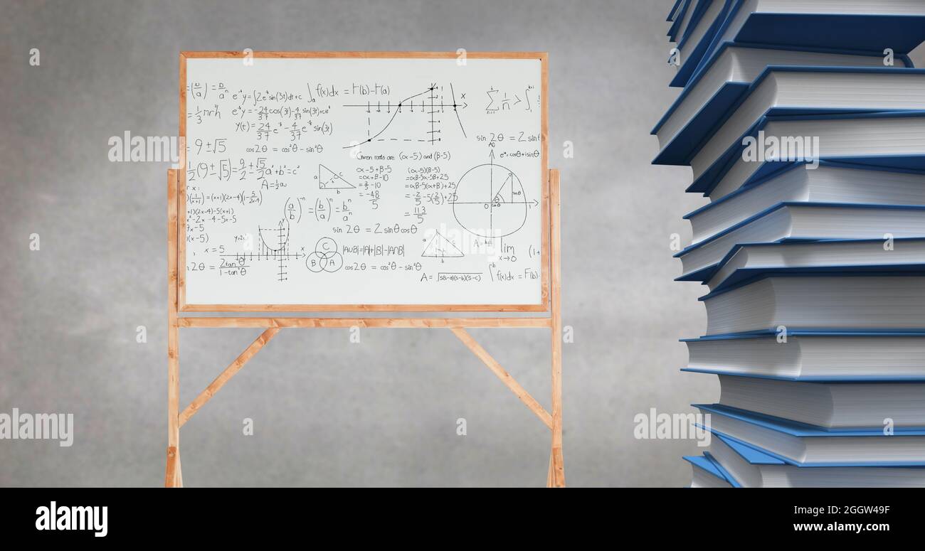 Pile of books and mathematical equations and graphs written in a white ...