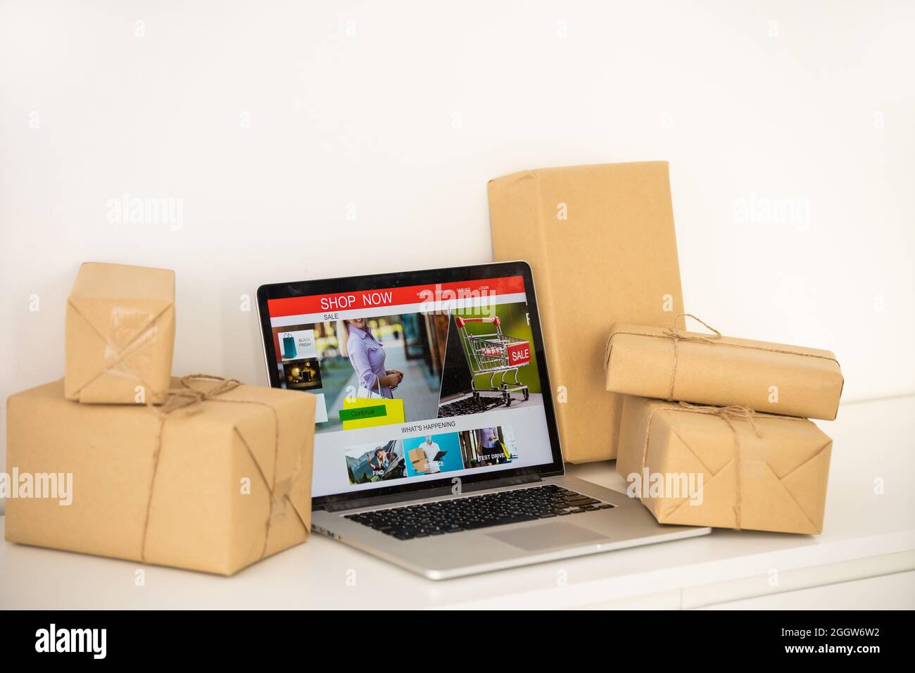 Online shopping - Paper cartons or parcel on a laptop keyboard ...