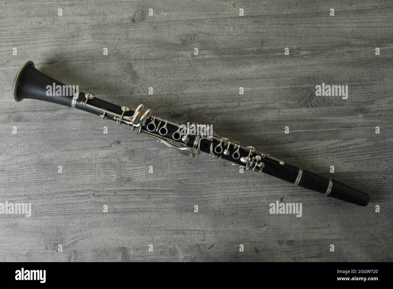 Clarinet on gray textured table, top view Stock Photo - Alamy