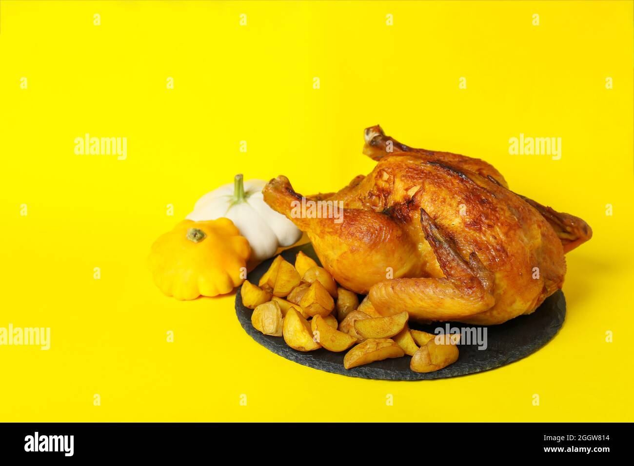 Thanksgiving Day roast turkey on yellow background Stock Photo - Alamy