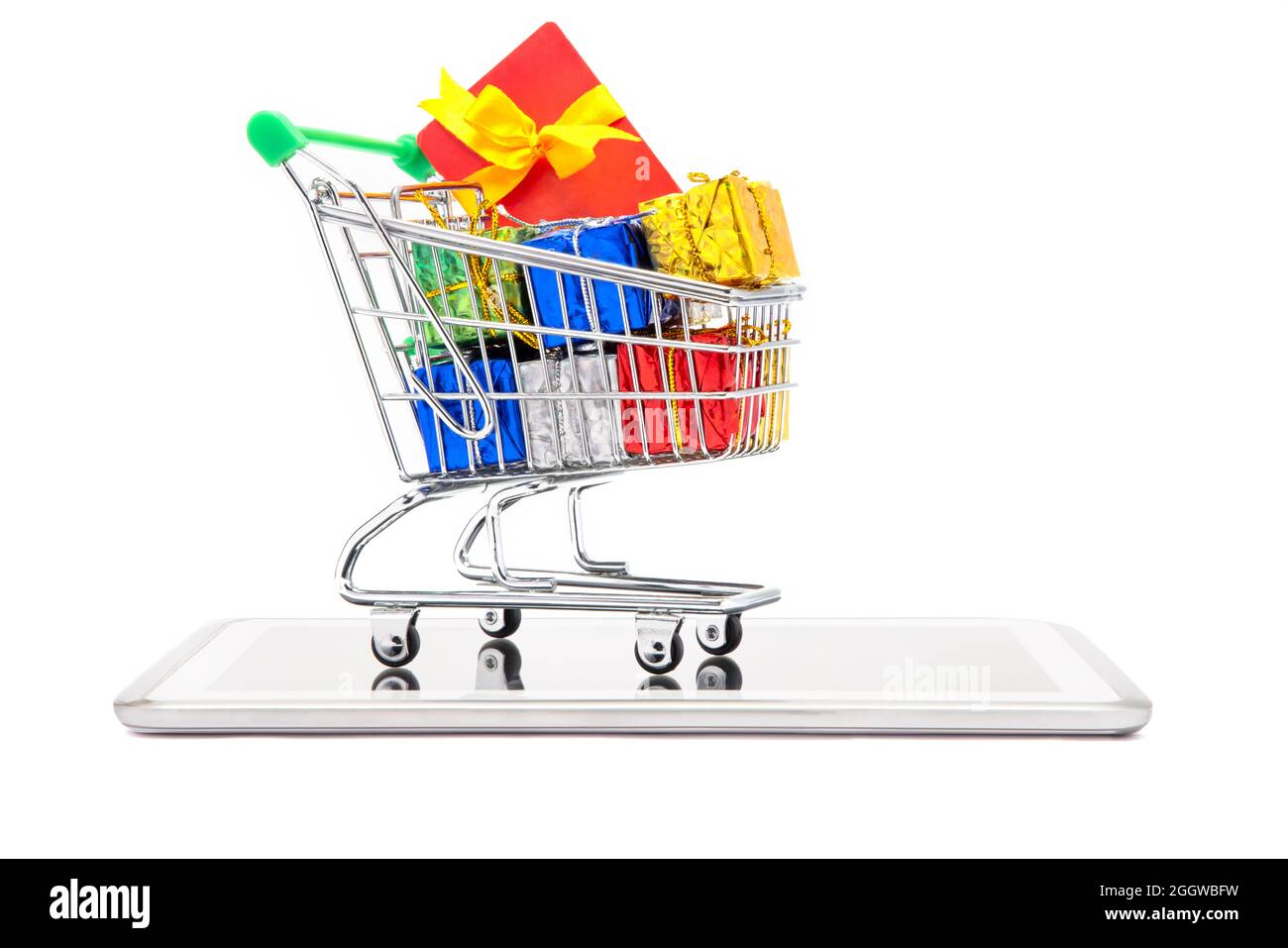 A shoppingcart consisting of giftboxes and giftcard kept on mobilephone ...