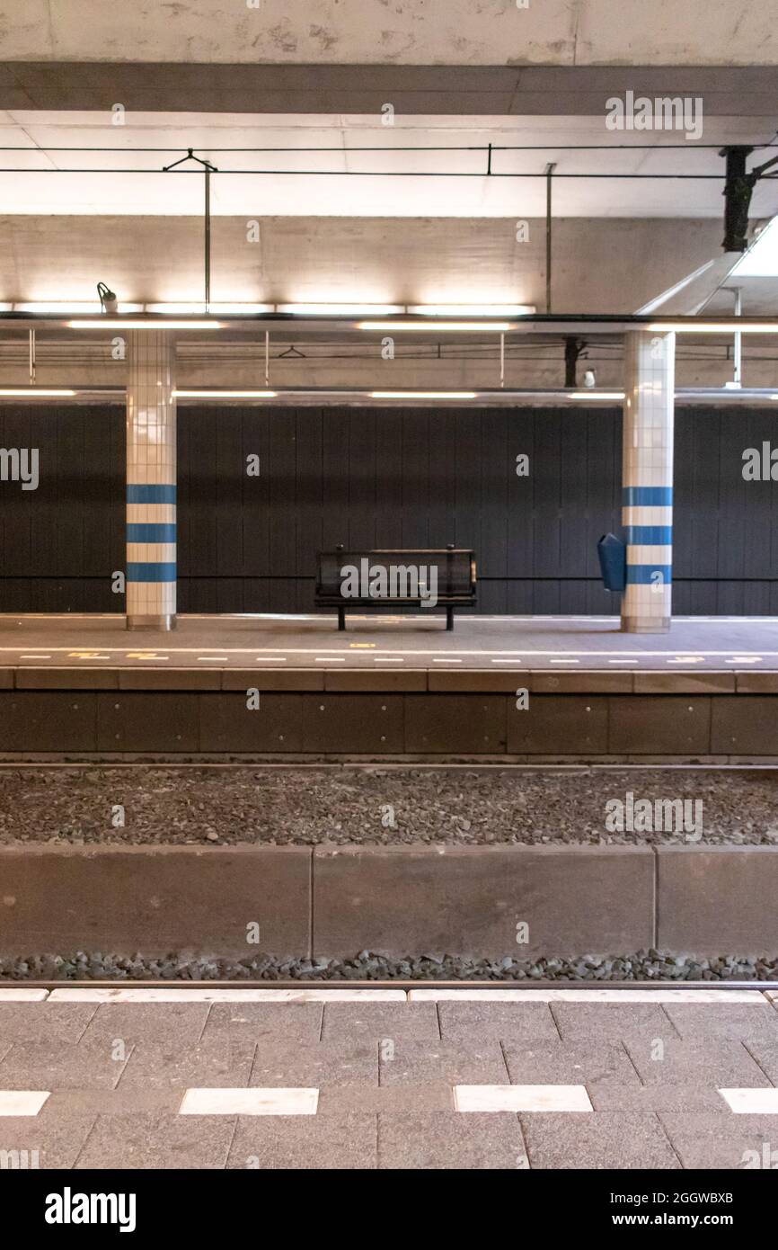 An empty bench on one of the platforms of Station Rijswijk (South ...