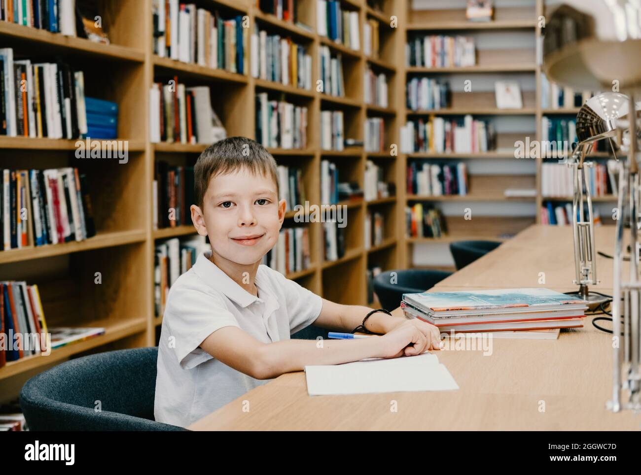 Boy book library hi-res stock photography and images - Alamy