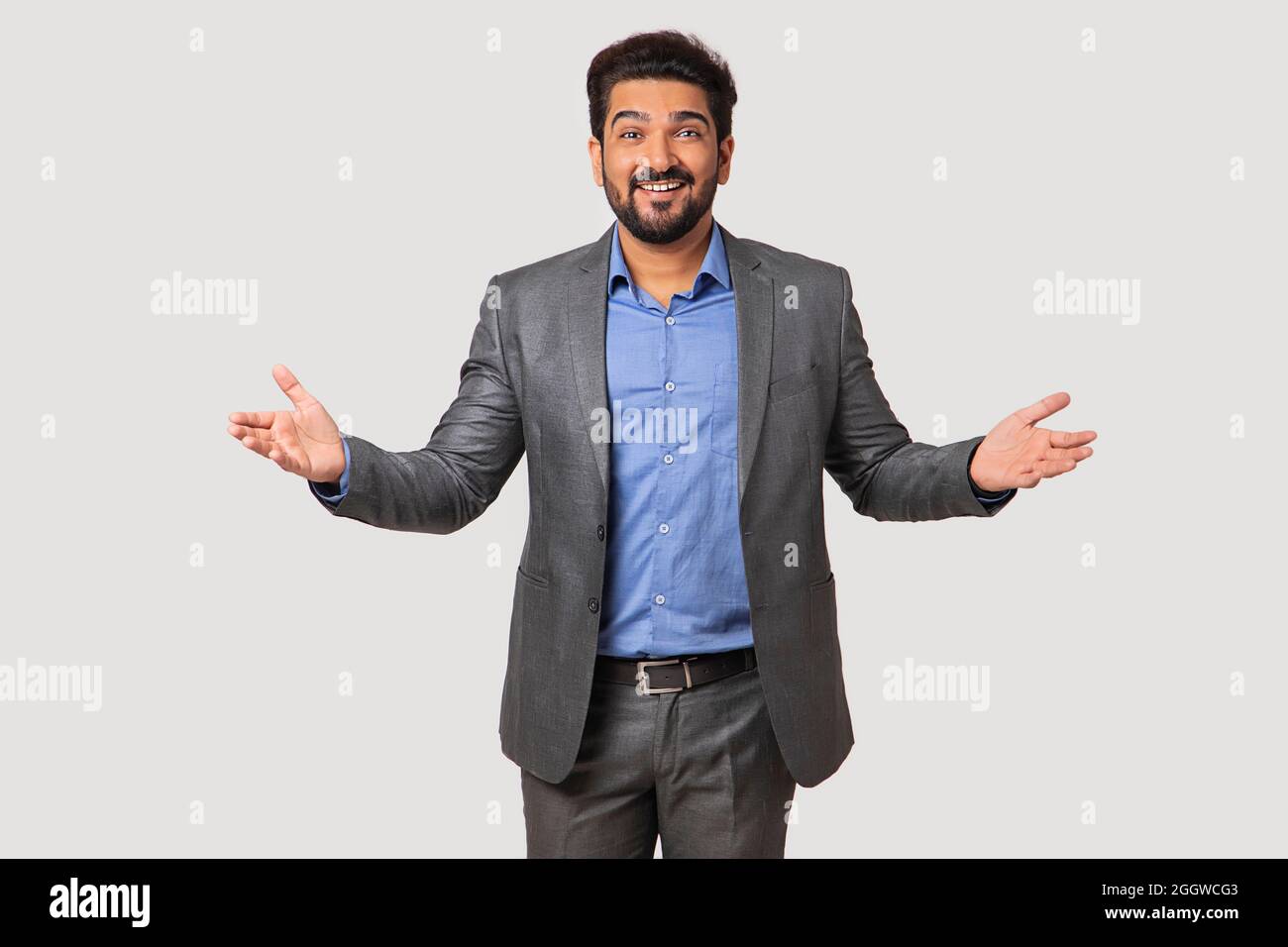 Man Standing Up In Suit