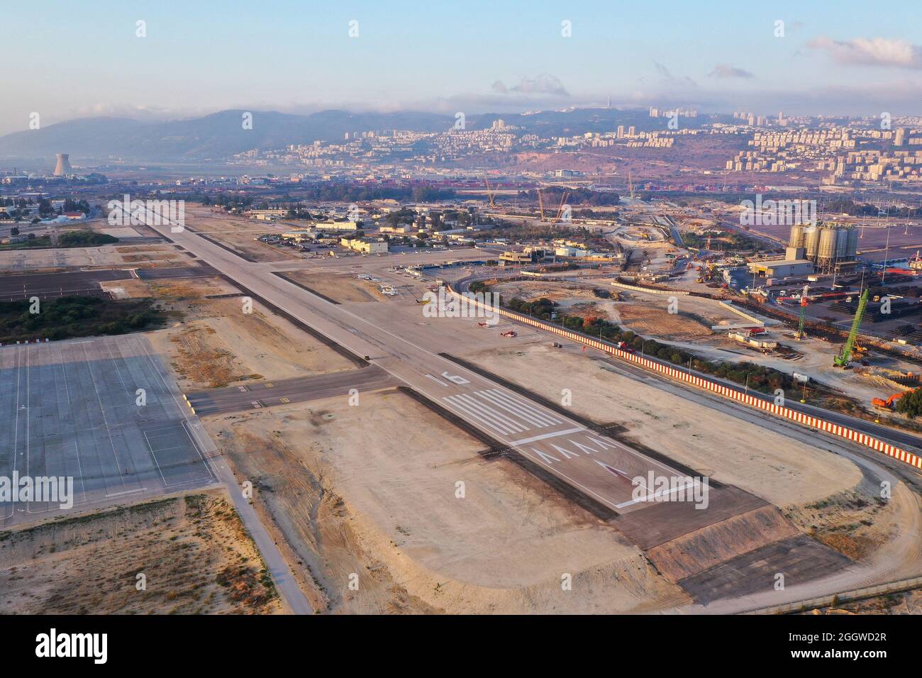 Haifa airport and runway with the city skyline in the background ...