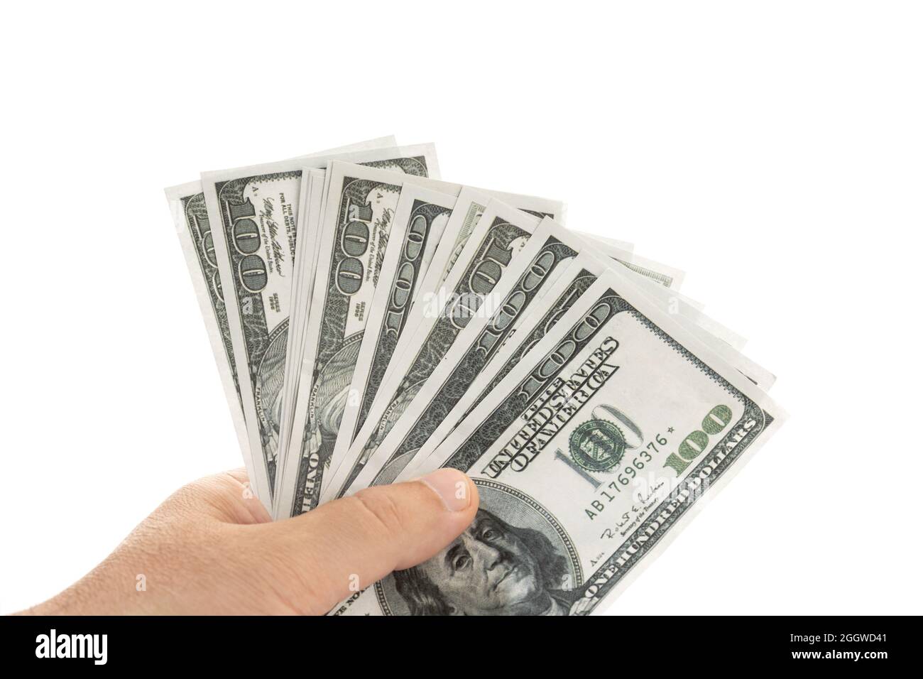 Hand holding money banknotes isolated on white background. US dollar ...