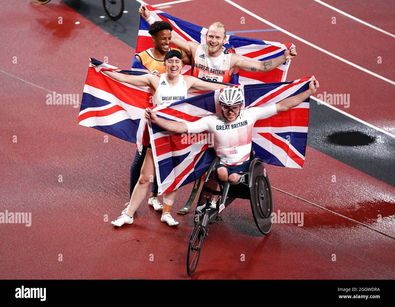 Great Britain's Libby Clegg (middle left), guide Chris Clarke (back ...