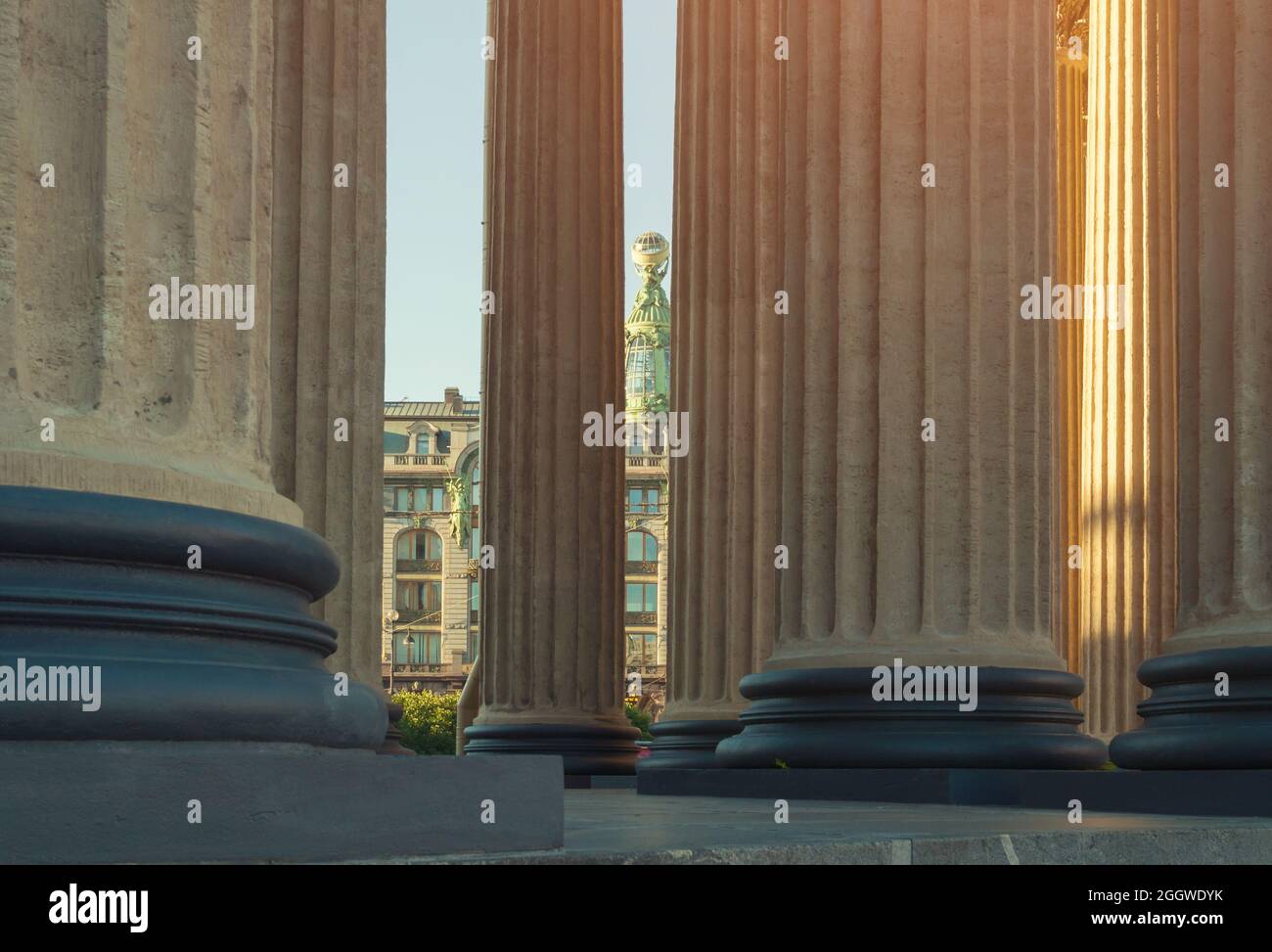 Architecture background of Kazan Cathedral colonnade and Zinger House between the columns in St ...