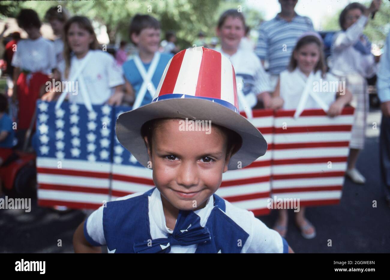 Austin Texas USA, circa 1994: Young boy in Uncle Sam-style hat poses in ...