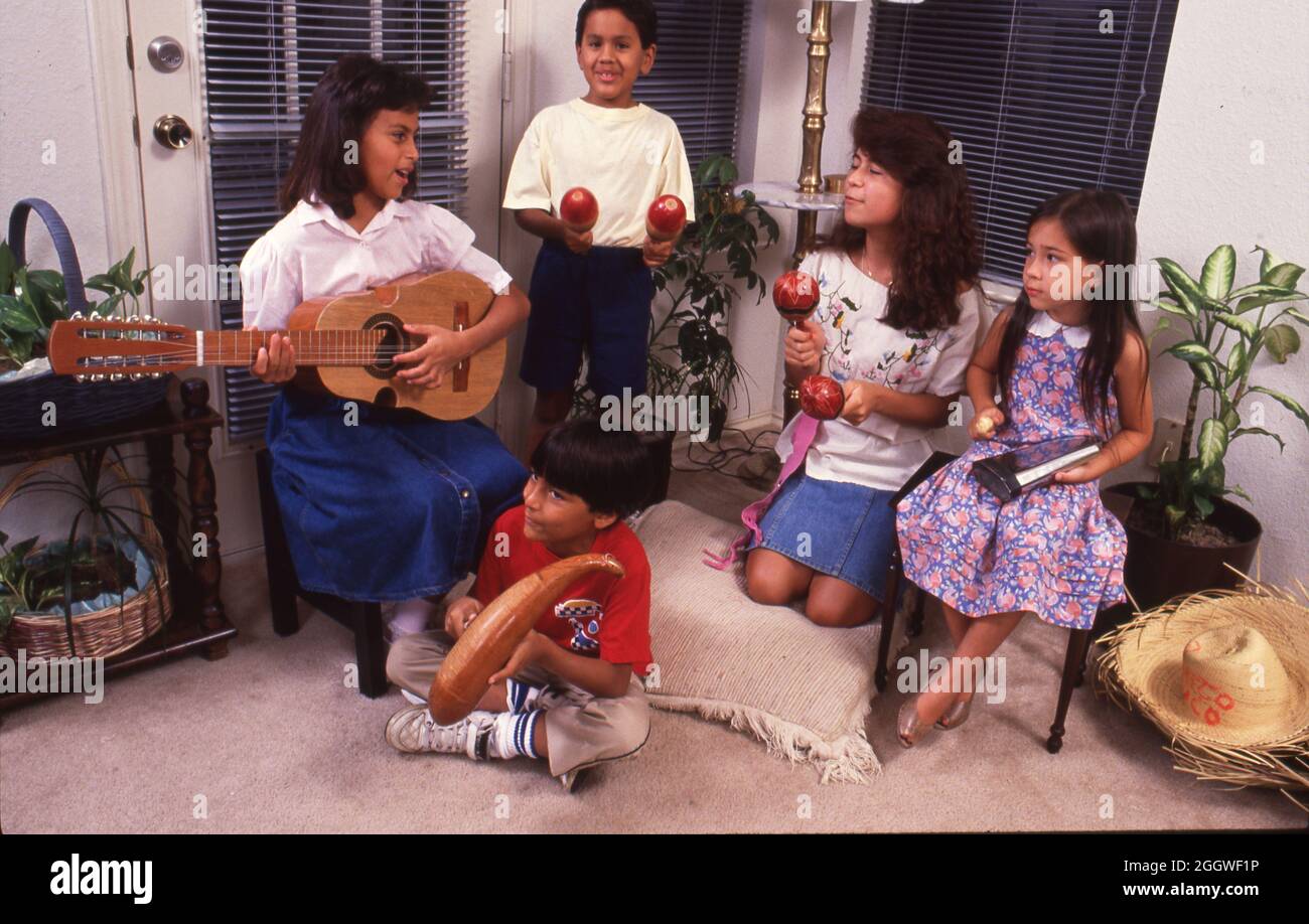 ©1989 Hispanic children playing instruments from Puerto Rico in ...
