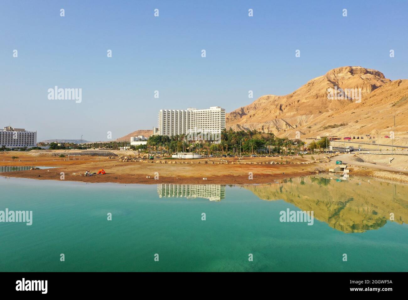 Dead Sea hotels and waterfront highway on a beautiful morning, Aerial ...
