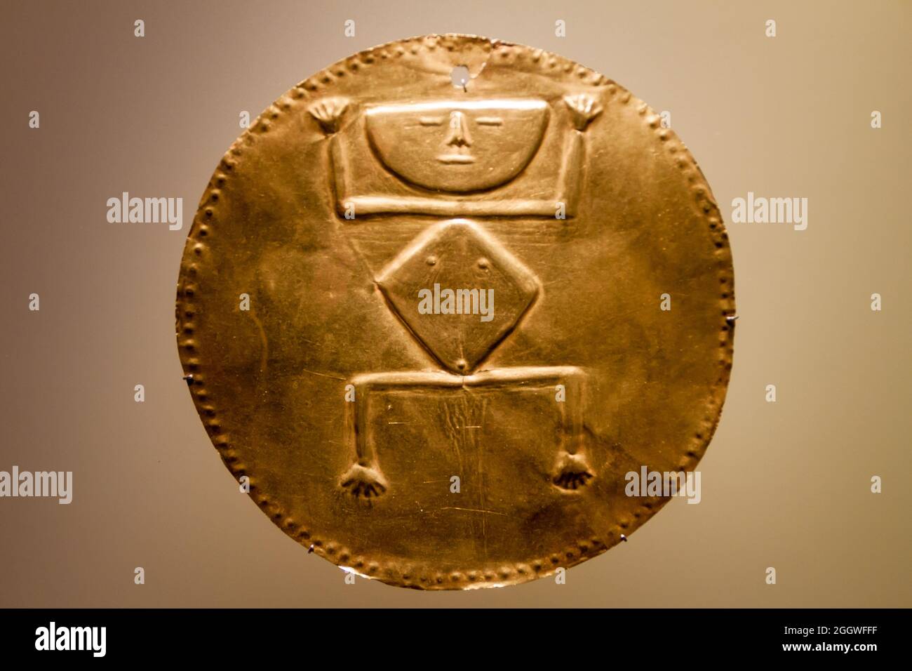 Golden plate in the Museum of Gold in Bogota, Colombia Stock Photo - Alamy