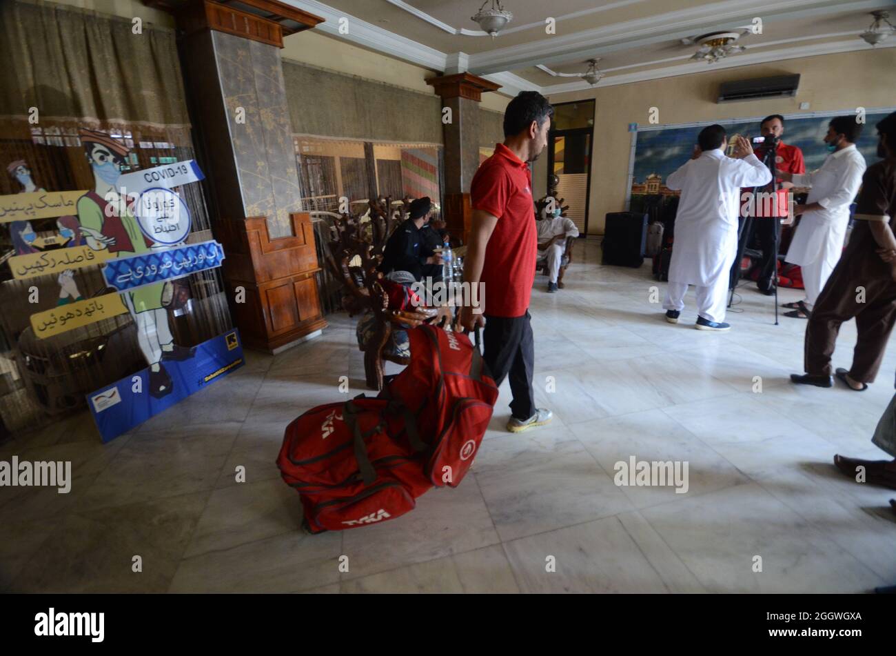 Afghanistan cricket team players board a bus from a local hotel to ...