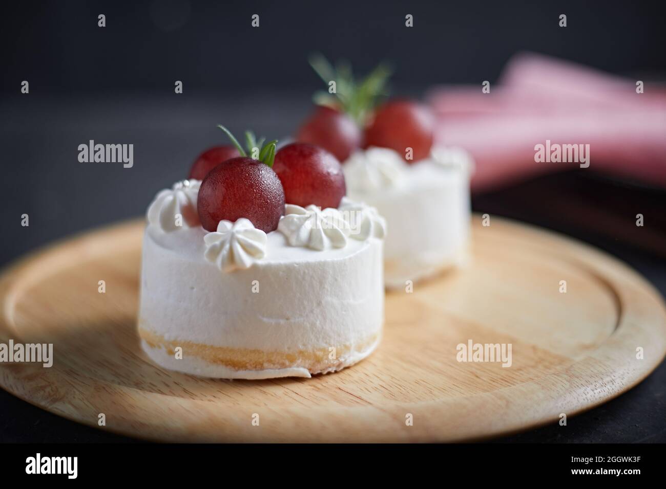 Cake with fresh fruits. Grapes on the cake. Homemade baking. Sweet ...
