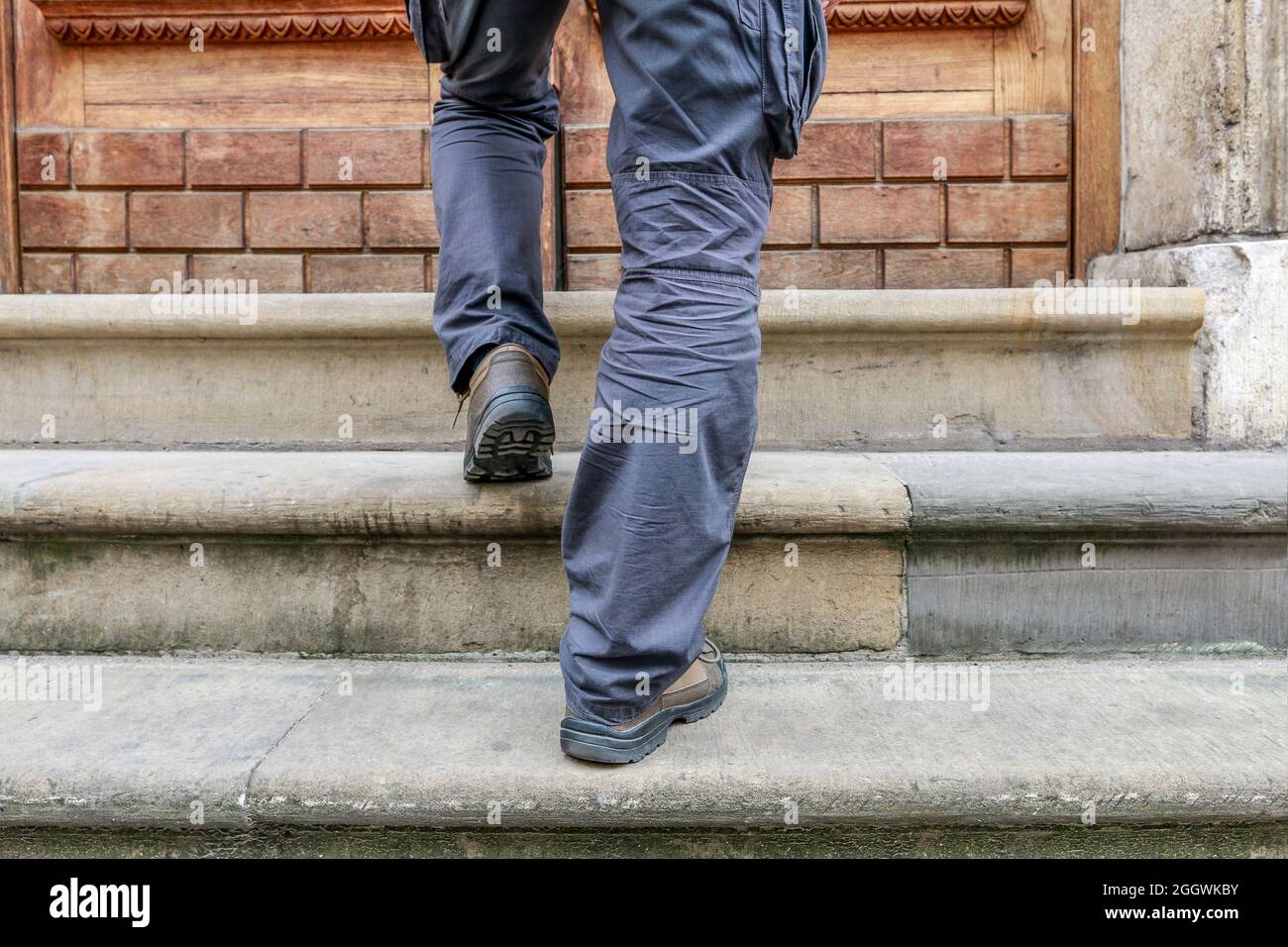Traveler goes up the stairs. Travel ime Stock Photo - Alamy