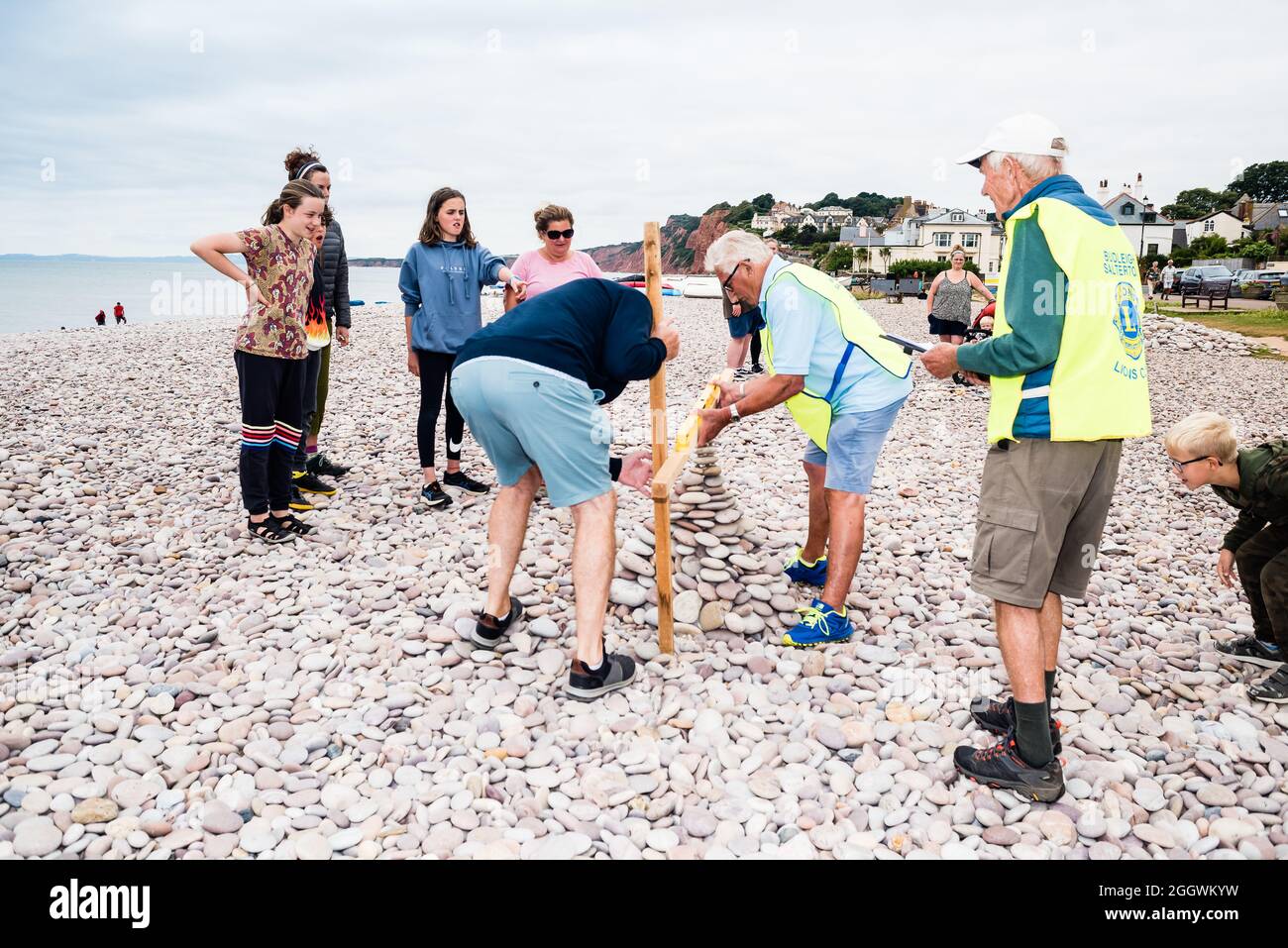 Judging the Budleigh Lions Pebble Tower Building Competition Stock ...