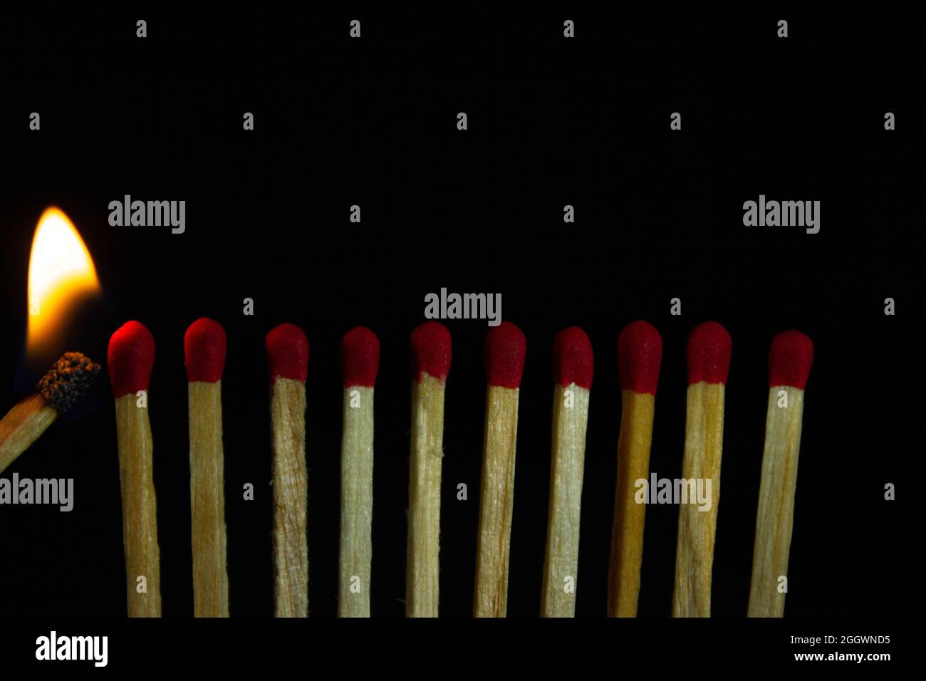 Group of red match burning isolated on black background. Row Burning In ...