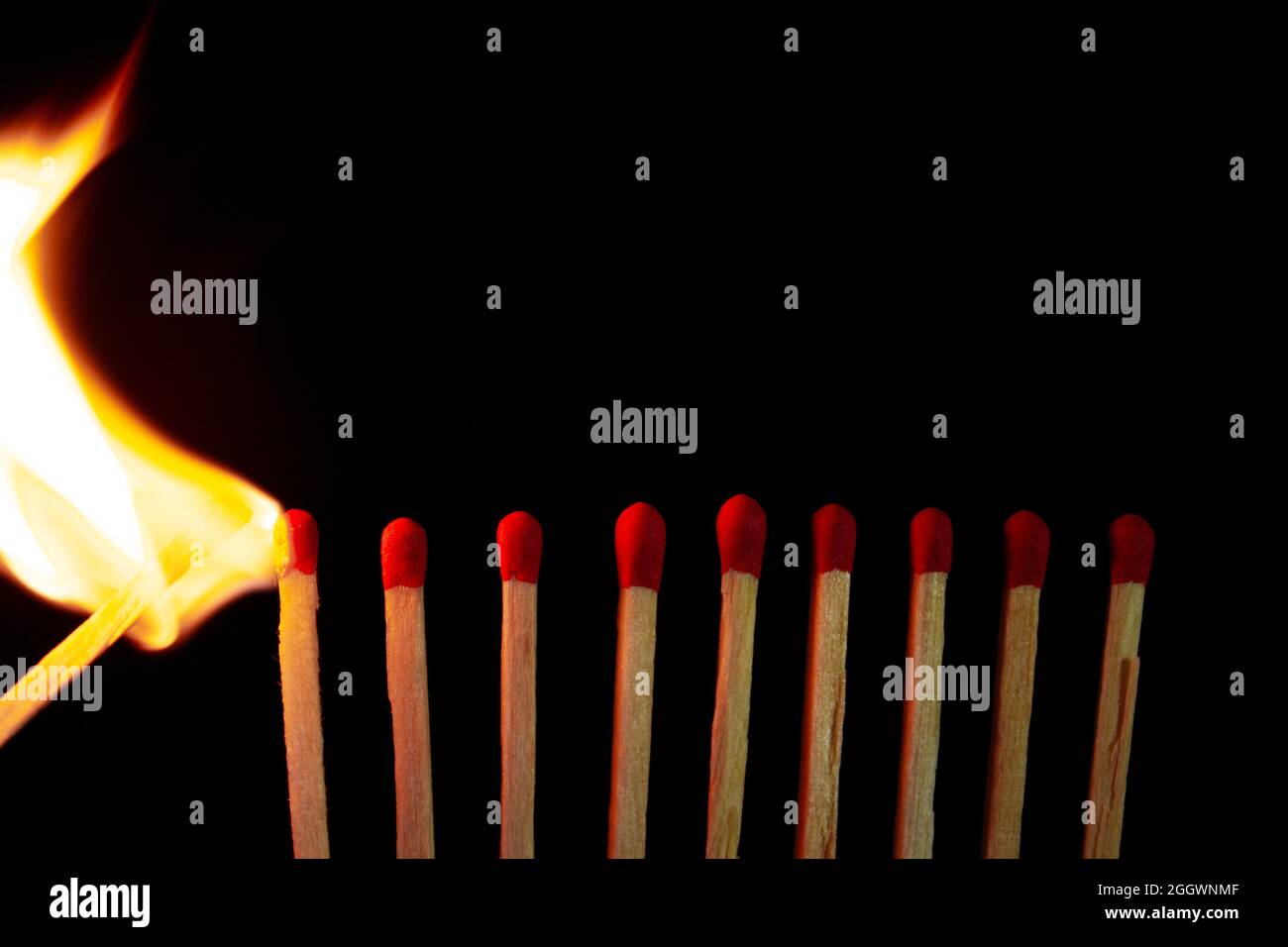 Group of red match burning isolated on black background. Row Burning In ...