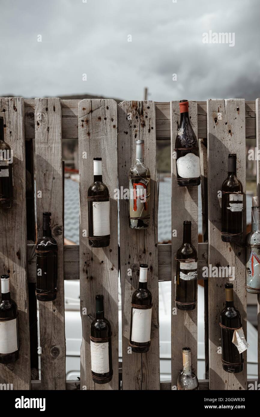 Wine bottles at exhibition with the cloudy sky on the background Stock ...