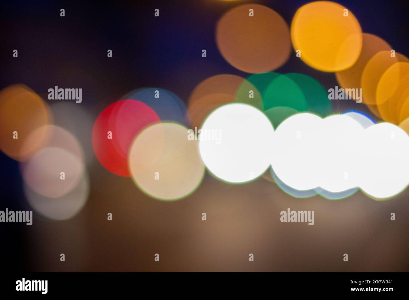 Defocused blurred glittering bokeh cars hi-res stock photography and ...