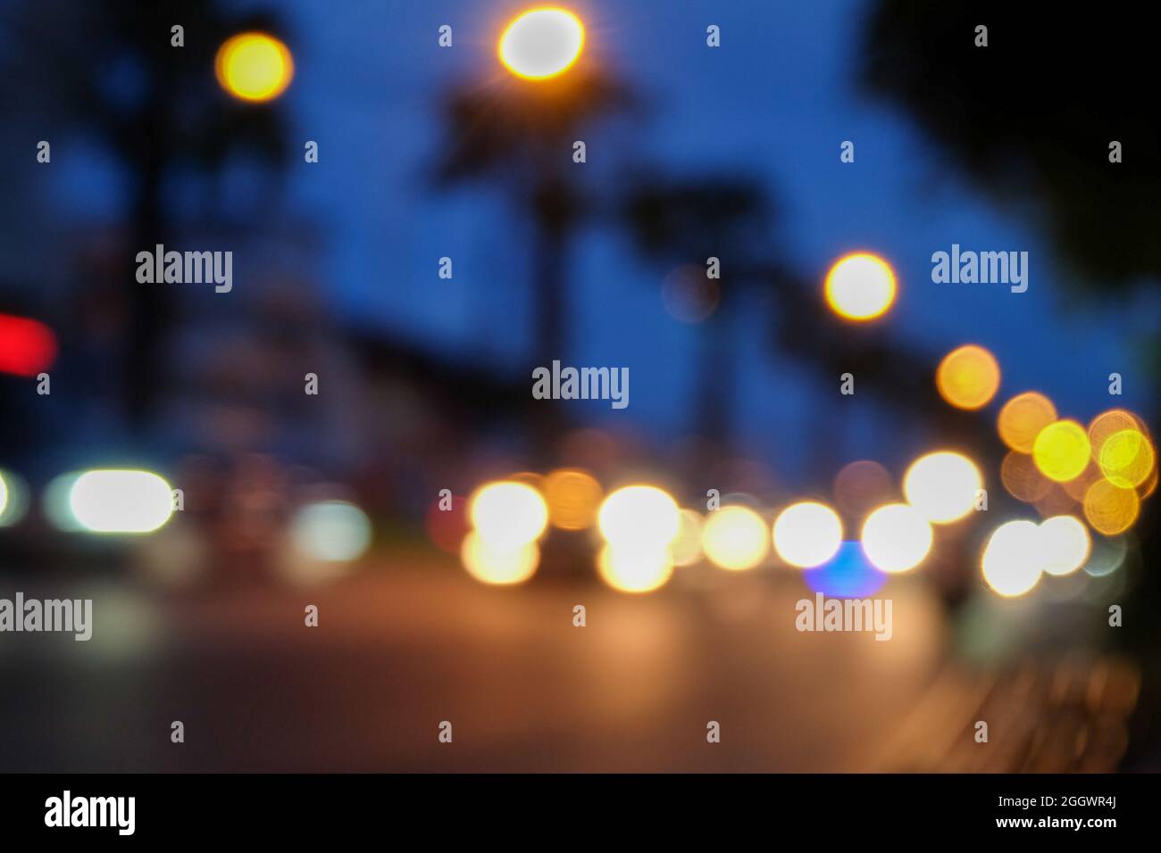 out of focus beautiful glittering blurred bokeh of cars and traffic ...