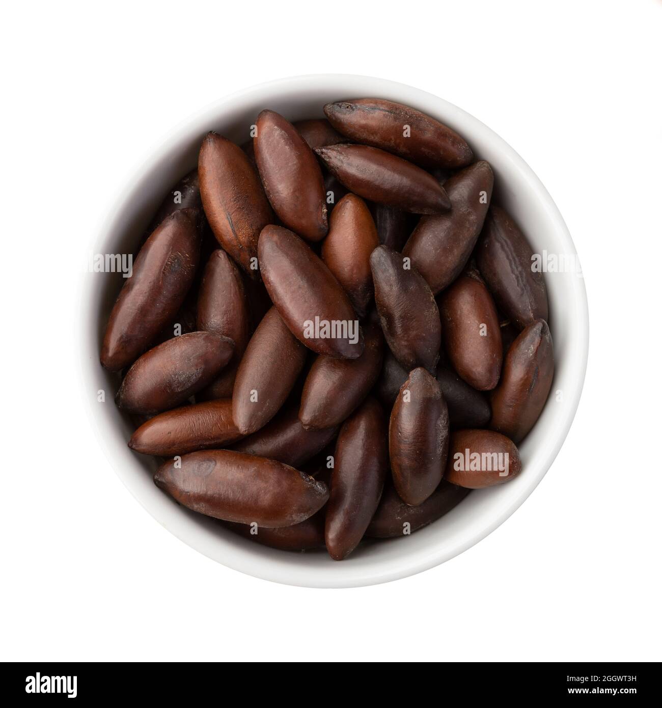 Bowl of brazilian baru nuts isolated over white background Stock Photo ...