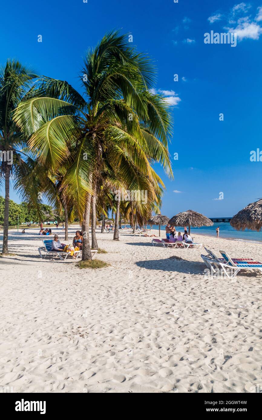 PLAYA GIRON, CUBA - FEB 14, 2016: Tourists at the beach Playa Giron ...
